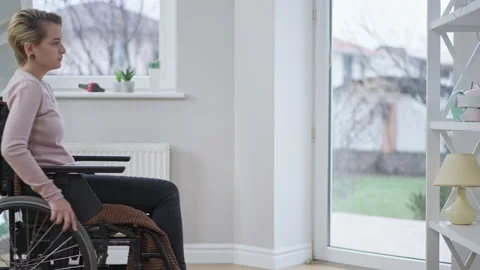 Side view of young lonely disabled woman... | Stock Video | Pond5