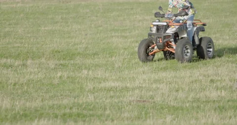 Side view of a young man speeding on an ... | Stock Video | Pond5