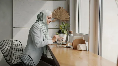 Side view of young muslimah wearing hija... | Stock Video | Pond5