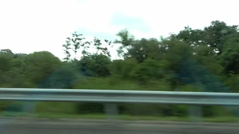 Side window view out of a fast driving c... | Stock Video | Pond5