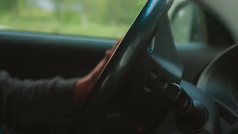 Sideways view of steering wheel | Stock Video | Pond5