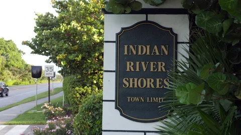 Sign 'Indian River Shores' by road. Vero... | Stock Video | Pond5