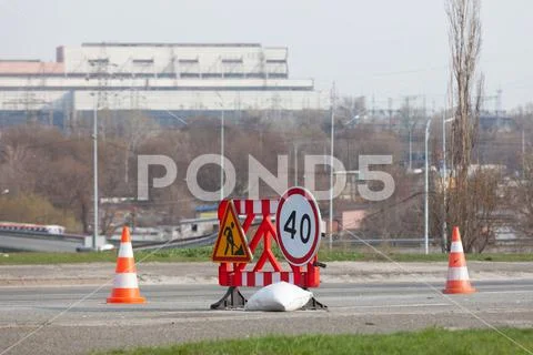 Sign road works and speed limit forty, road works. Stock Image #128536111