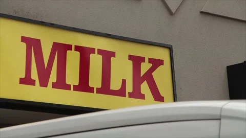 sign that says milk in red capital lette... | Stock Video | Pond5