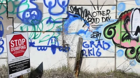 Signage - STOP dumping signage and graff... | Stock Video | Pond5