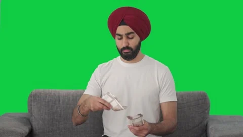 Sikh Indian man counting money Green scr... | Stock Video | Pond5