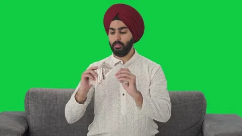 Sikh Indian man counting money Green scr... | Stock Video | Pond5
