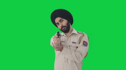 Sikh Indian police man pointing gun Gree... | Stock Video | Pond5