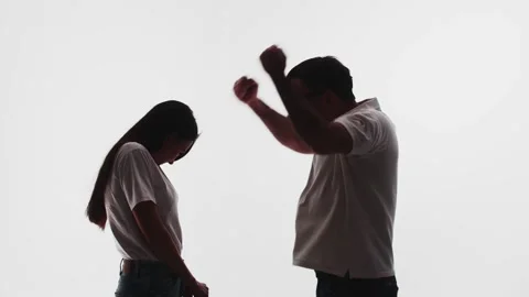 Silhouette of angry man who shakes hands... | Stock Video | Pond5