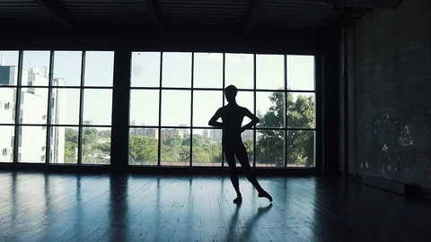 silhouette of a ballet dancer on a windo... | Stock Video | Pond5