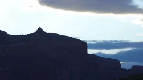 Silhouette of a desert mesa during sunse... | Stock Video | Pond5