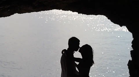 Silhouette of a kiss in slow motion | Stock Video | Pond5