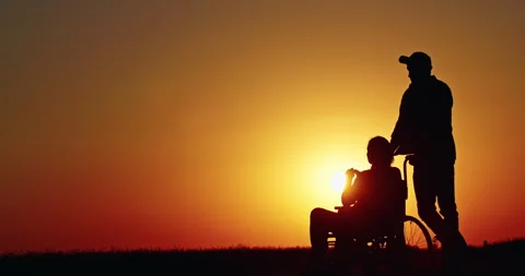 Silhouette of a man gently pushing a wom... | Stock Video | Pond5