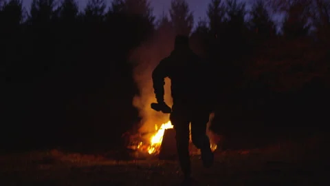 Man Running Into Fire Stock Footage ~ Royalty Free Stock Videos | Pond5