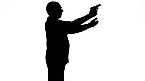 Silhouette of a man in profile shooting ... | Stock Video | Pond5