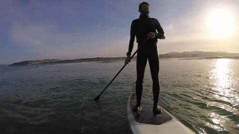 Silhouette of a man sup stand up paddleb... | Stock Video | Pond5