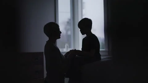 Silhouette of a Mother Speaking Lovingly... | Stock Video | Pond5