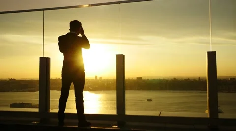 silhouette of one person talking on the ... | Stock Video | Pond5