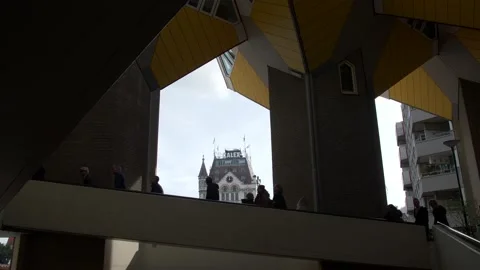 Silhouette people walking. Cube houses i... | Stock Video | Pond5