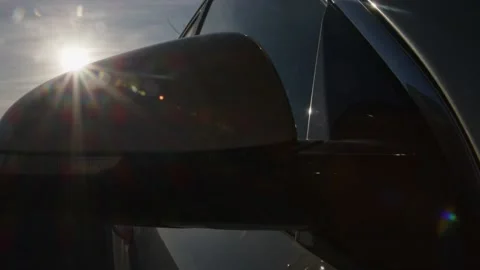 silhouette of rear view mirror in sunlig... | Stock Video | Pond5