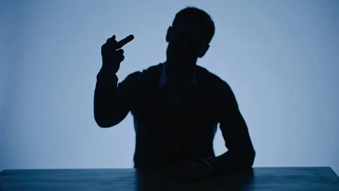 Silhouette of a rude angry man demonstra... | Stock Video | Pond5