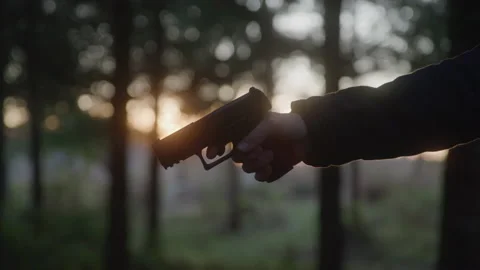 Silhouette of Shaking Man Pointing Gun a... | Stock Video | Pond5