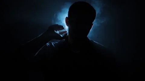 Silhouette shot of a mafia boss or a hit... | Stock Video | Pond5