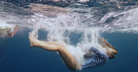 silhouette of sinking woman underwater, ... | Stock Video | Pond5