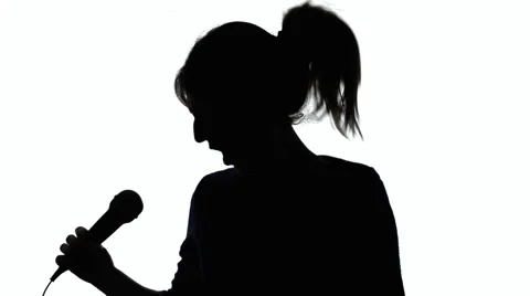 Silhouette woman sing crazy | Stock Video | Pond5