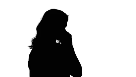 Silhouette Woman talking on the phone. | Stock Video | Pond5