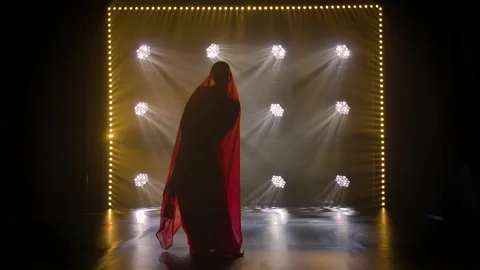 Silhouette a young girl dancer in a red ... | Stock Video | Pond5