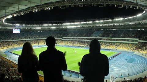 Silhouettes of football fans shouting fo... | Stock Video | Pond5
