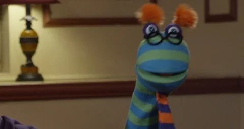 Silly Looking Puppet Listening Intently ... | Stock Video | Pond5