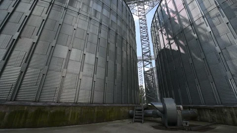 Silo grain tank. Low angle view,moving i... | Stock Video | Pond5