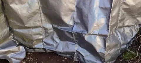 Silver grey background sheet of tarp blo... | Stock Video | Pond5