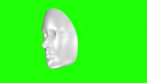 A silver mask rotates on a green screen.... | Stock Video | Pond5