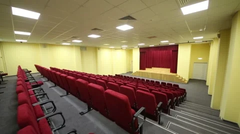 Simple and small auditorium with red arm... | Stock Video | Pond5