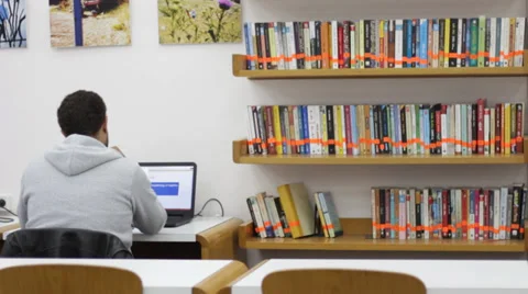 Singal student study in library | Stock Video | Pond5