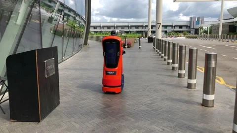 Singapore: Autonomous robot on patrol at... | Stock Video | Pond5