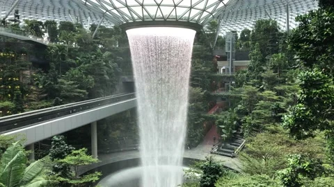 Singapore: Rain vortex indoor waterfall ... | Stock Video | Pond5