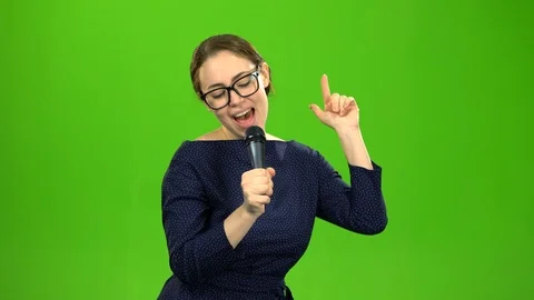 Singer performs a song. Green screen | Stock Video | Pond5