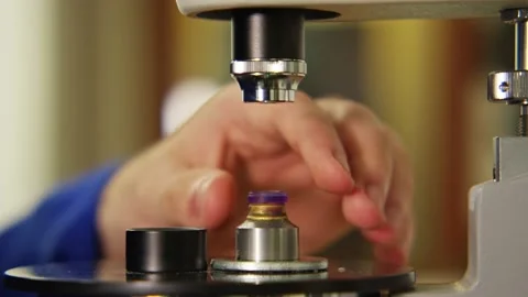 A single contact lens being examined und... | Stock Video | Pond5