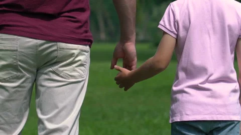 Single dad brings up son alone, holding ... | Stock Video | Pond5