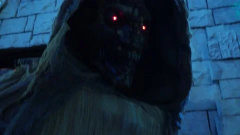 A sinister evil dead man in a hood with ... | Stock Video | Pond5