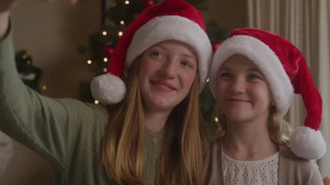 Sisters Smiling Together for a Selfie on... | Stock Video | Pond5