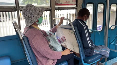 Sitting on a fan bus with opened window,... | Stock Video | Pond5