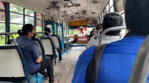 Sitting on a fan bus with opened window,... | Stock Video | Pond5