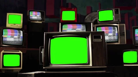 Six Old TVs Turning On Green Screens Amo... | Stock Video | Pond5