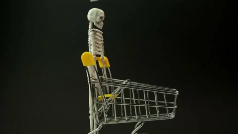 a skeleton carries a cart from a superma... | Stock Video | Pond5