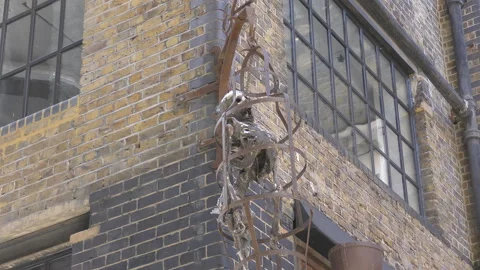 A skeleton inside an iron cage hanging o... | Stock Video | Pond5
